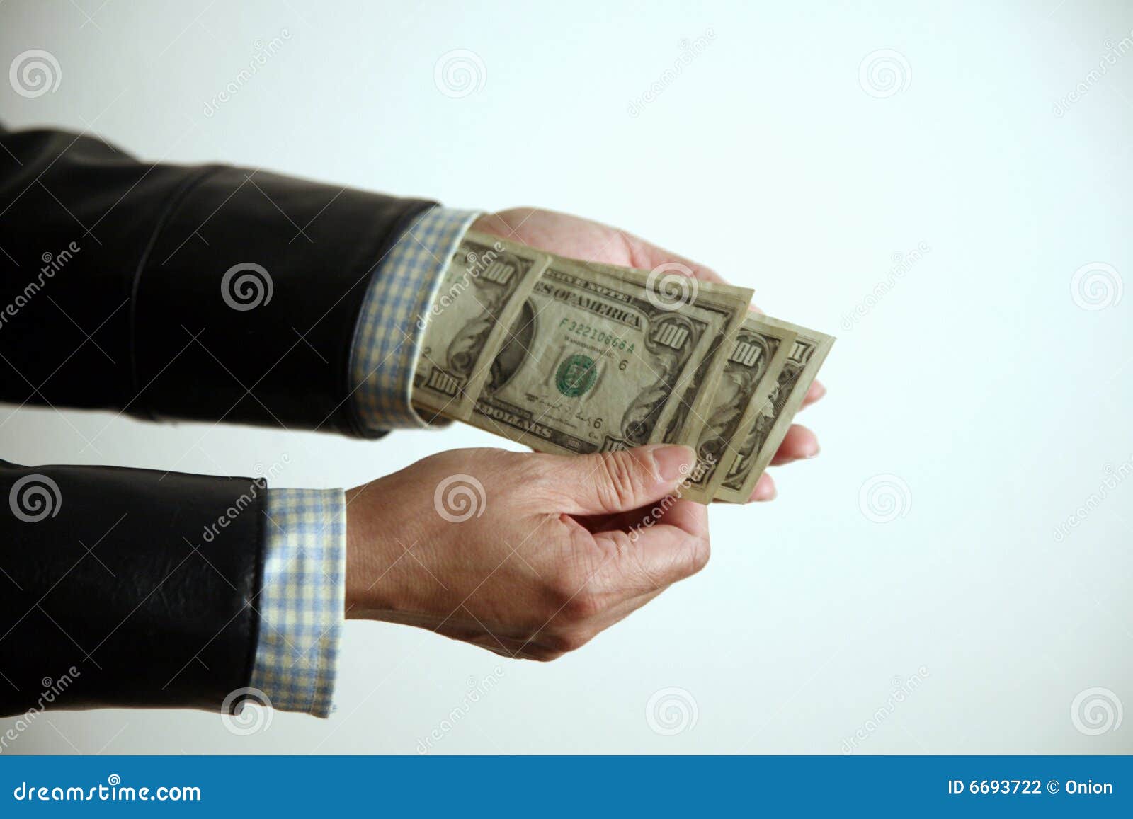 Hand Pulling Money from Sleeve Stock Photo - Image of denominations ...