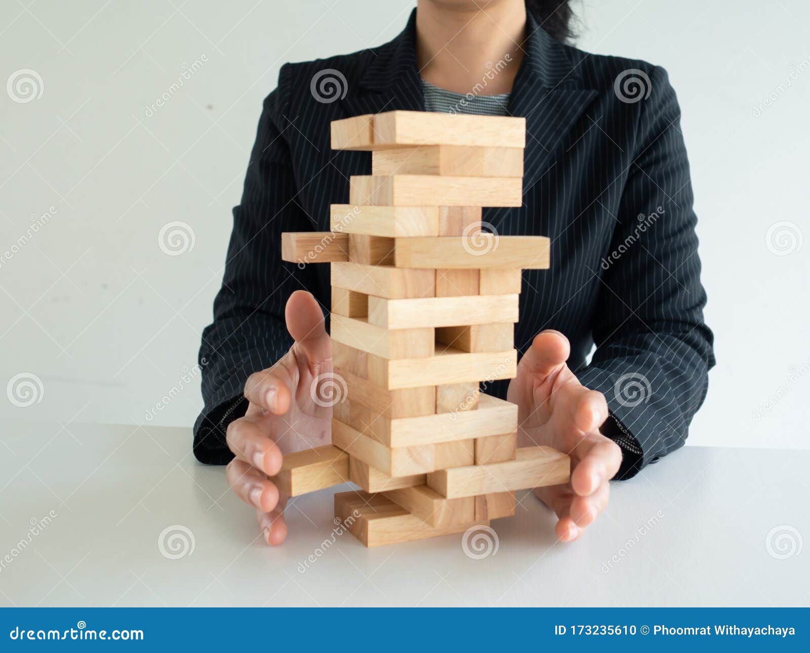 Business Womanâ€™s Hand is Protecting Falling Blocks Stock Photo ...