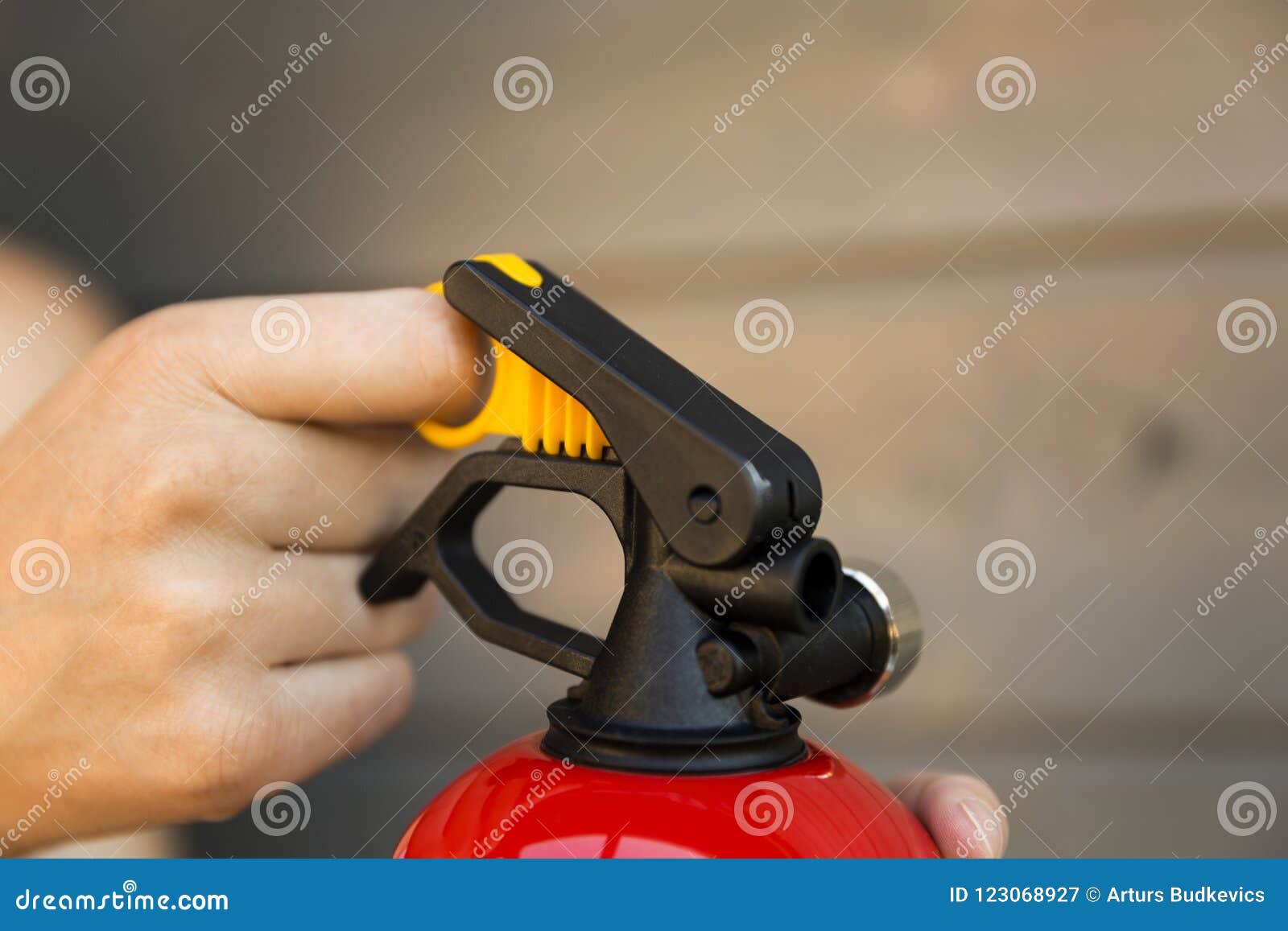Hand Pulling Pin of Fire Extinguisher. Safety Concept Stock Image ...