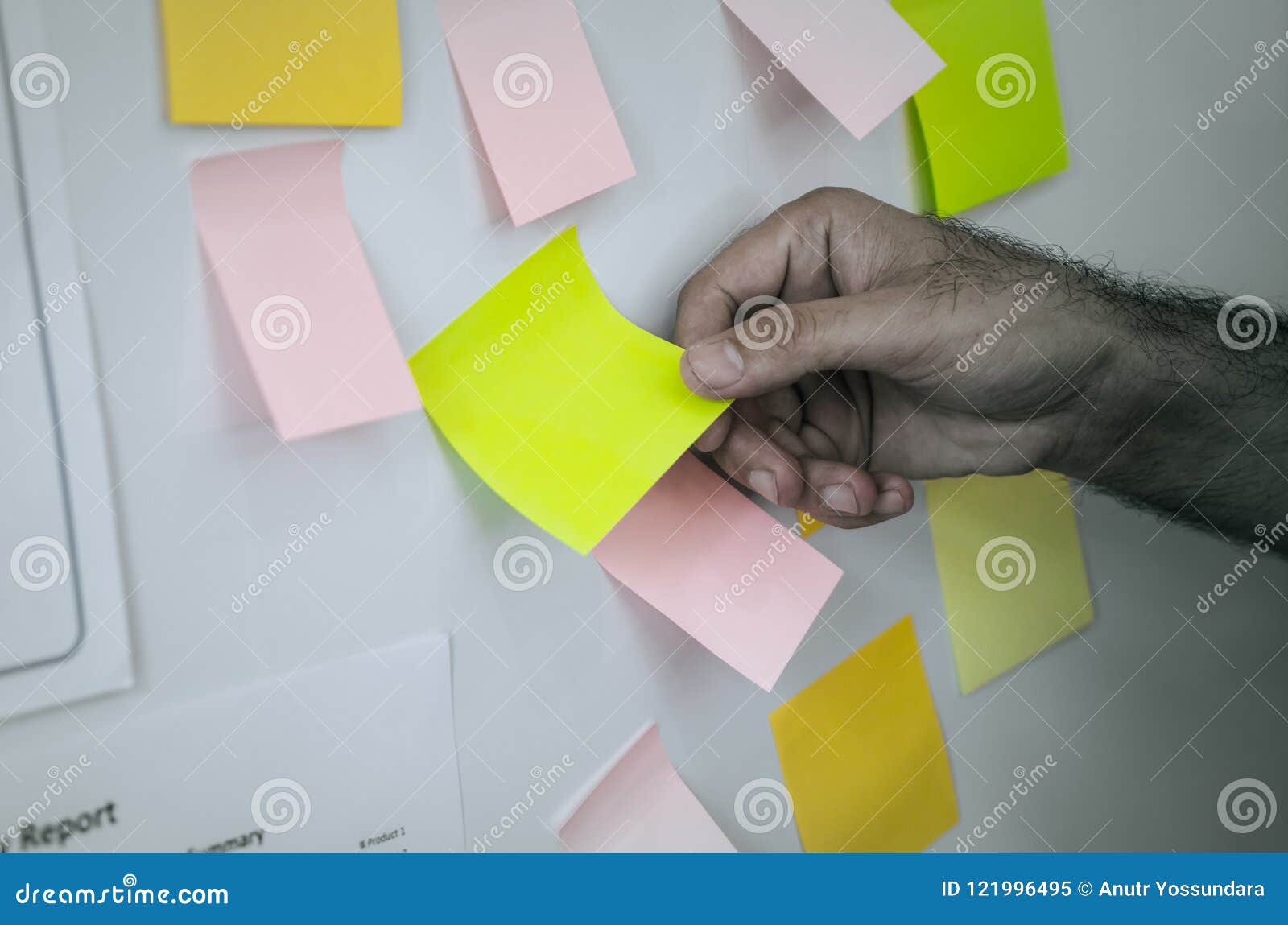 Hand Pulling Reminder Posted Note Paper Out of Board Stock Image ...