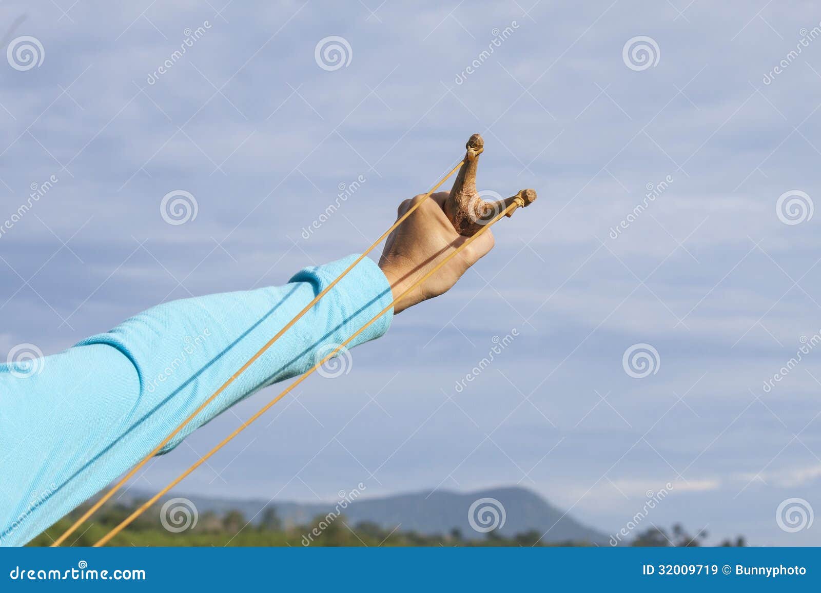 Hand pulling sling shot stock image. Image of catapult - 32009719