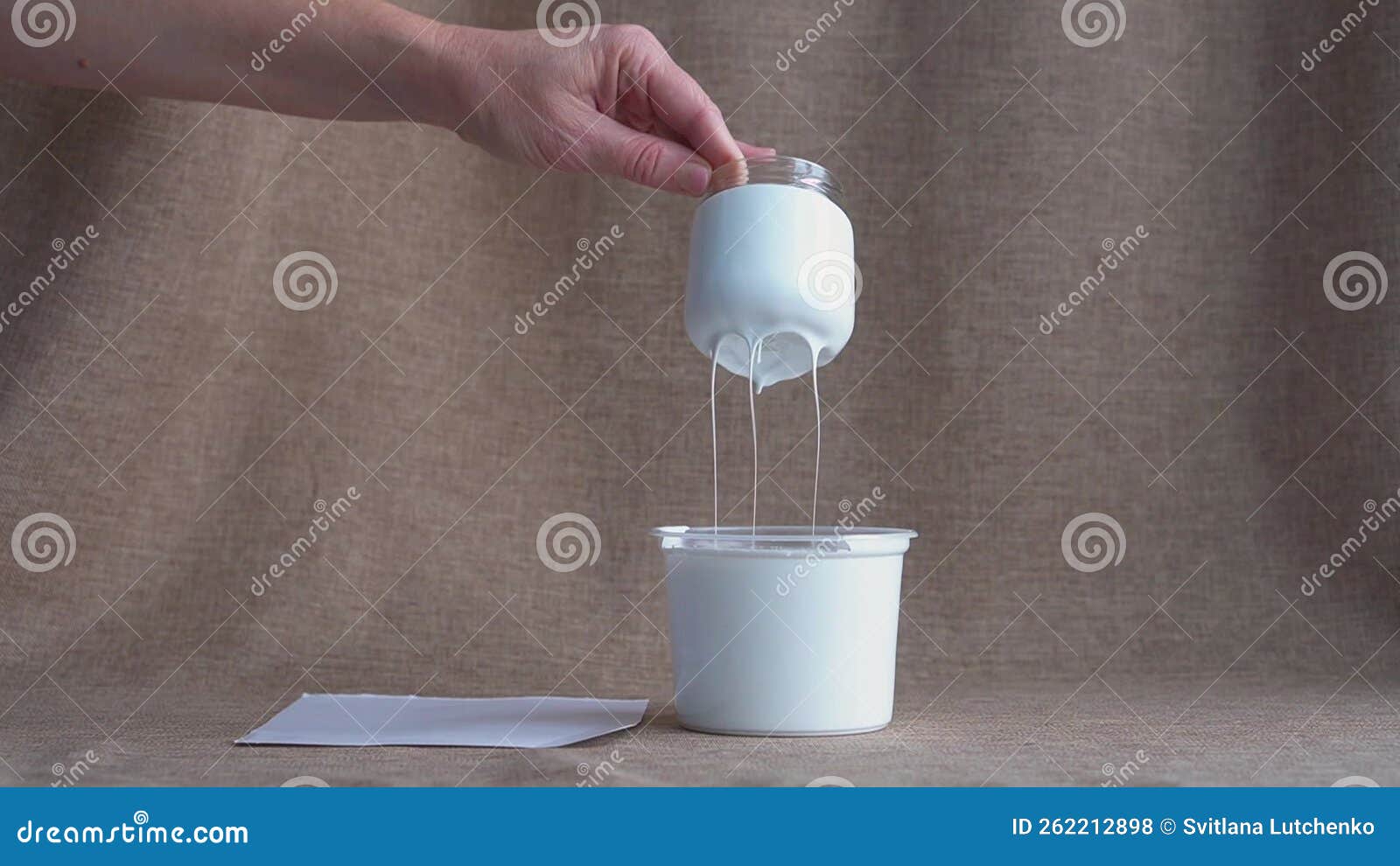 The Hand Pulls Out a Jar of White Paint. Stock Footage - Video of ...