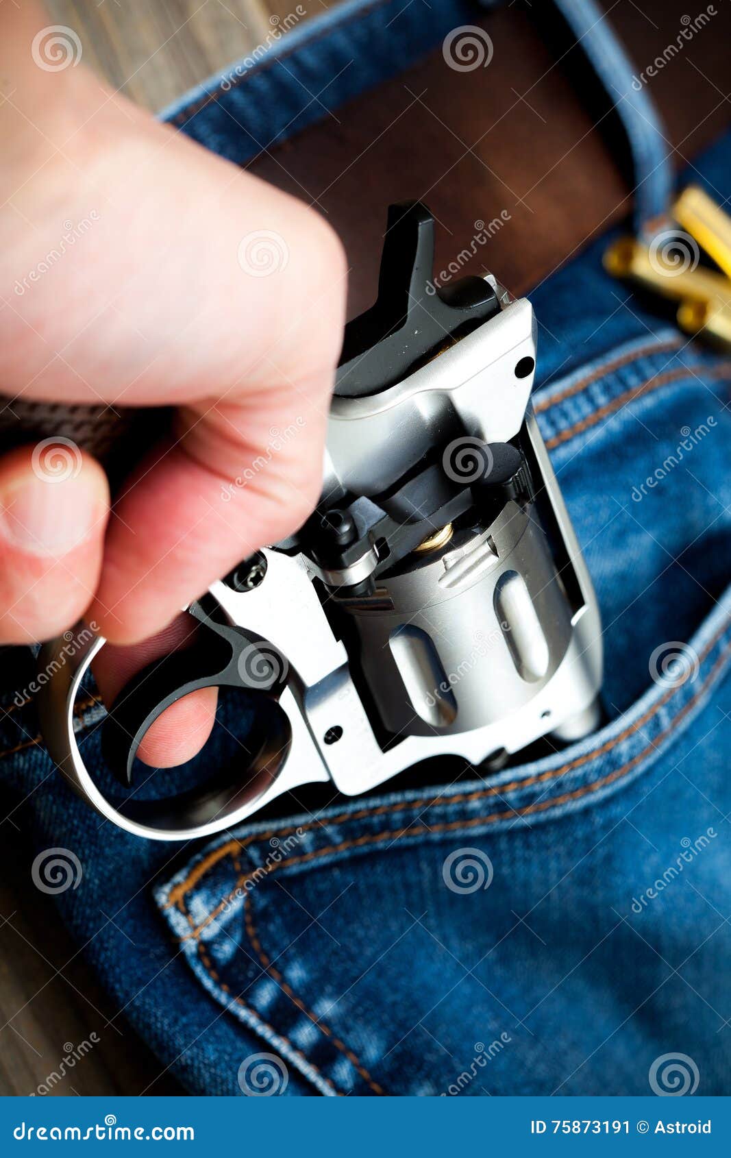 Hand Pulls Out a Revolver from the Pocket Stock Image - Image of ...