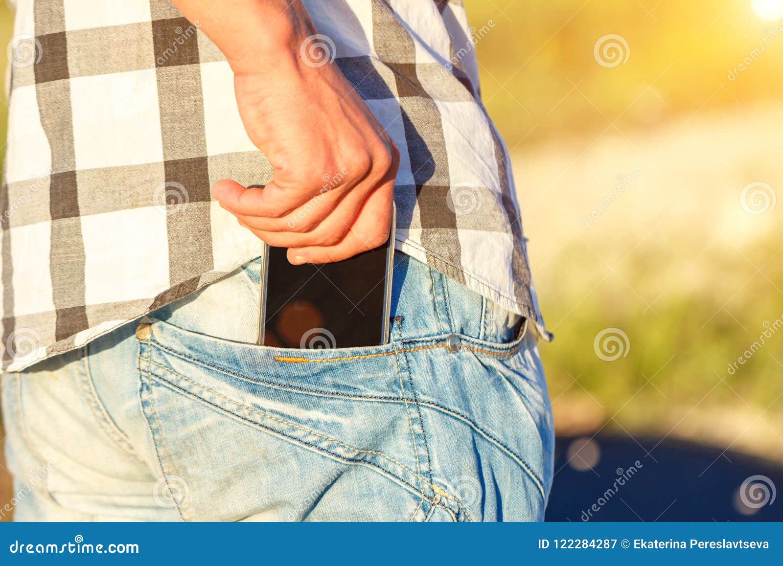 Hand Pulls the Phone Out of His Jeans Pocket Stock Image - Image of ...