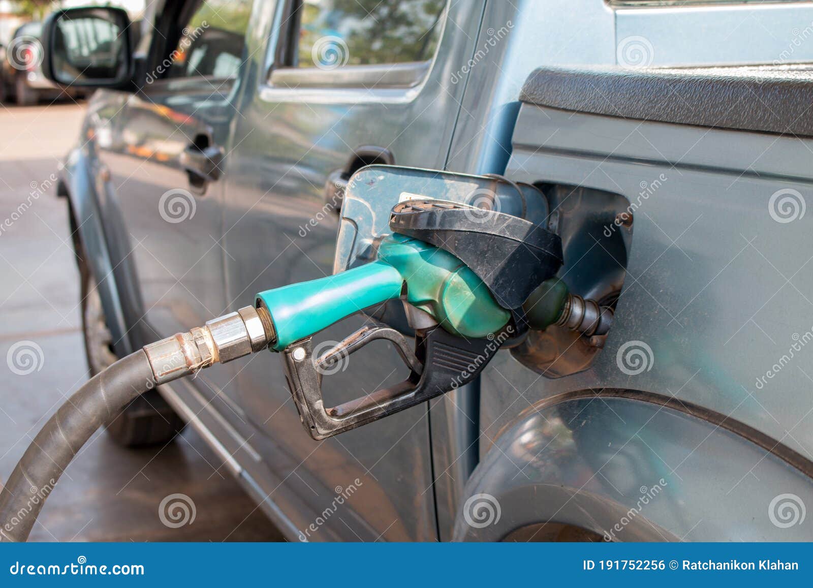 Gas Hand Pumping Gas into Car Stock Photo - Image of person, natural ...