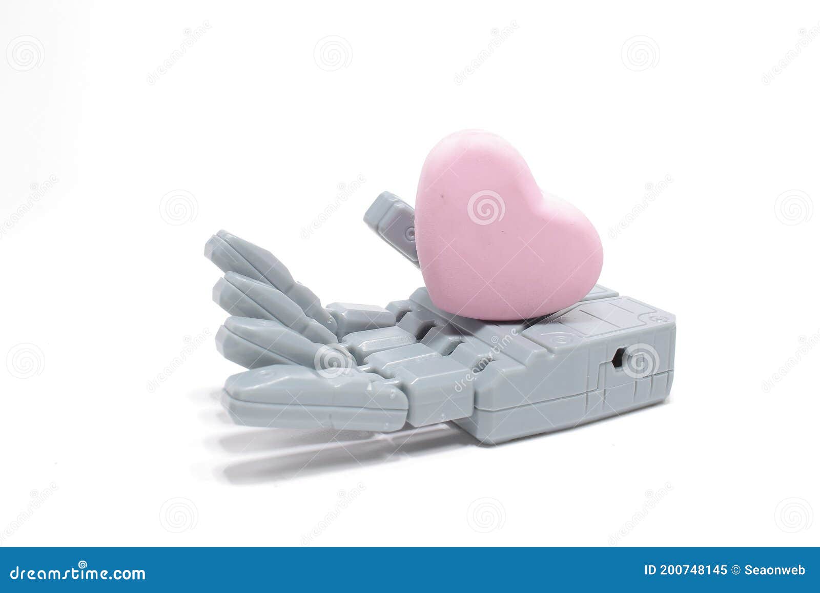 A Hand of Puppet with Heart Shaped Paper Isolated on White Stock Image ...