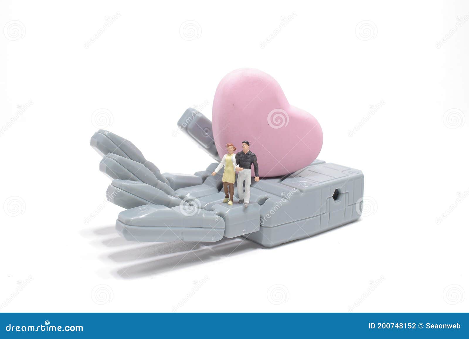 A Hand of Puppet with Heart Shaped Paper Isolated on White Stock Photo ...