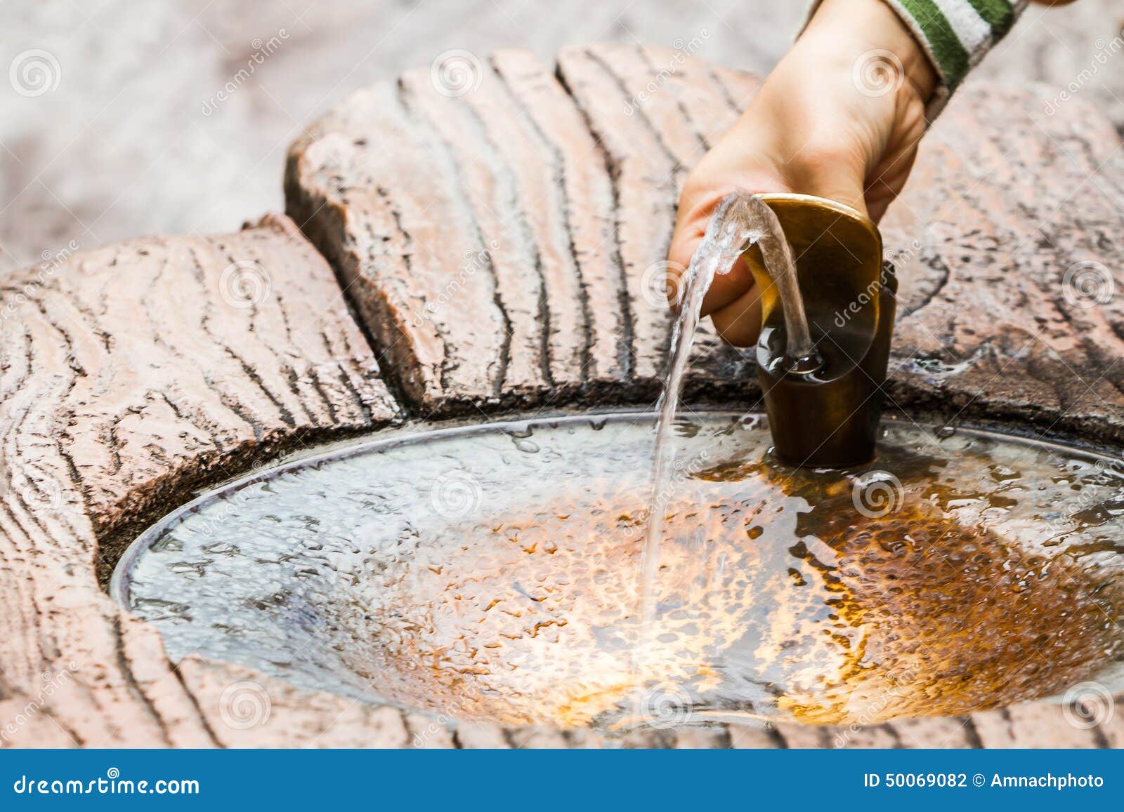Hand Push Button of Drinking Water the Faucet. Stock Photo - Image of ...