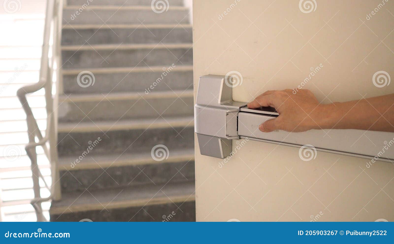 Hand is Pushing Fire Door Handle of Fire Exit for Emergency Evacuation ...