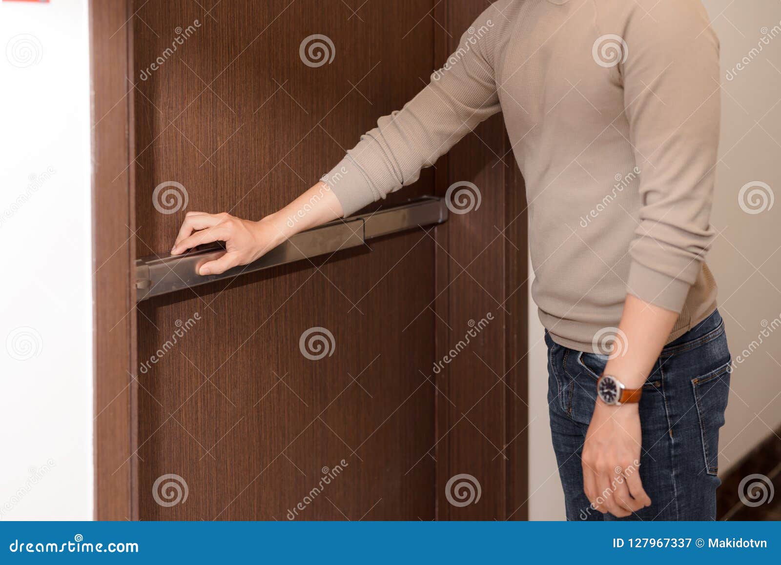 Hand is Pushing/opening the Emergency Fire Exit Door Stock Image ...