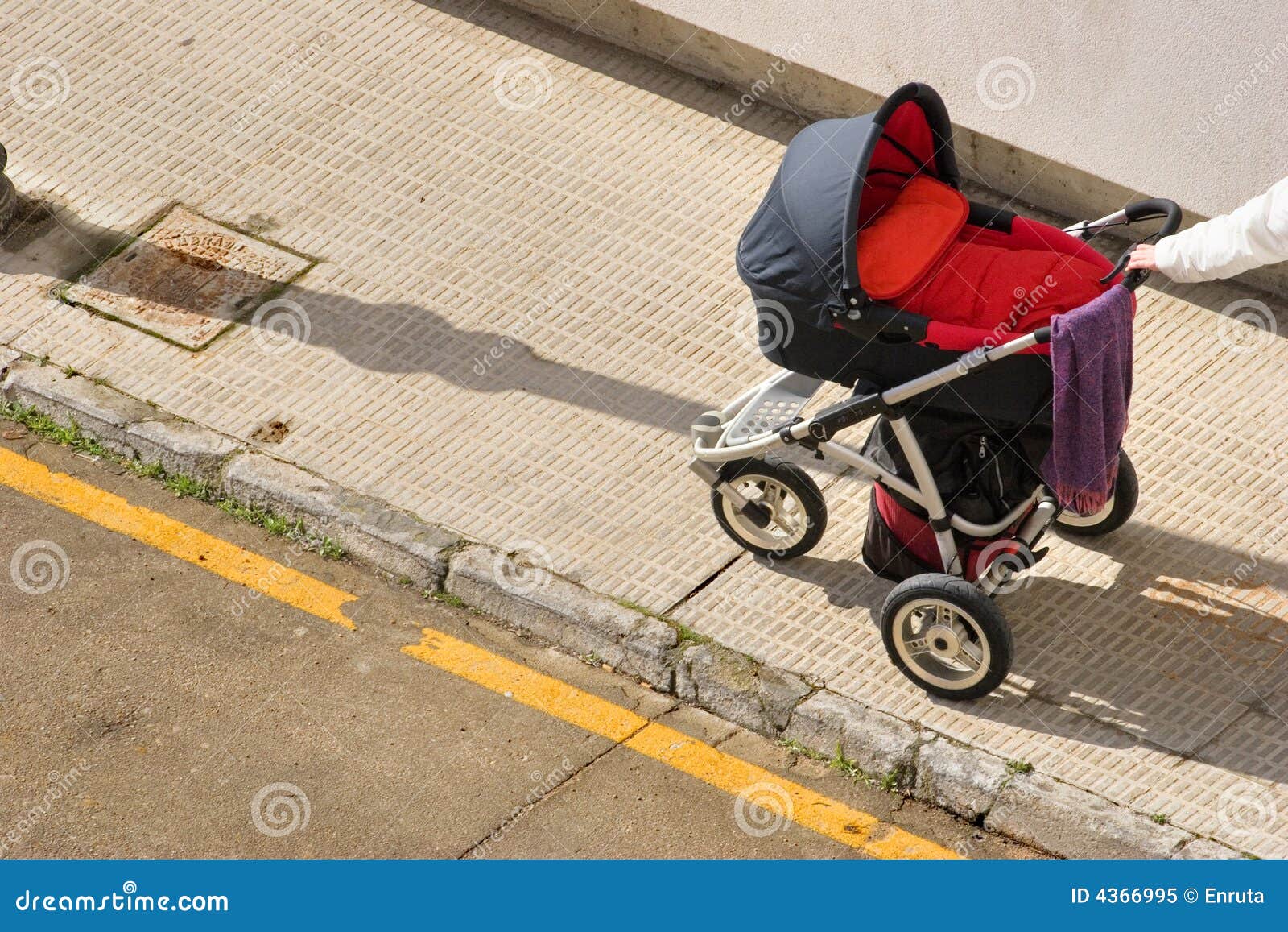 Hand pushing a pram stock image. Image of walking, background - 4366995