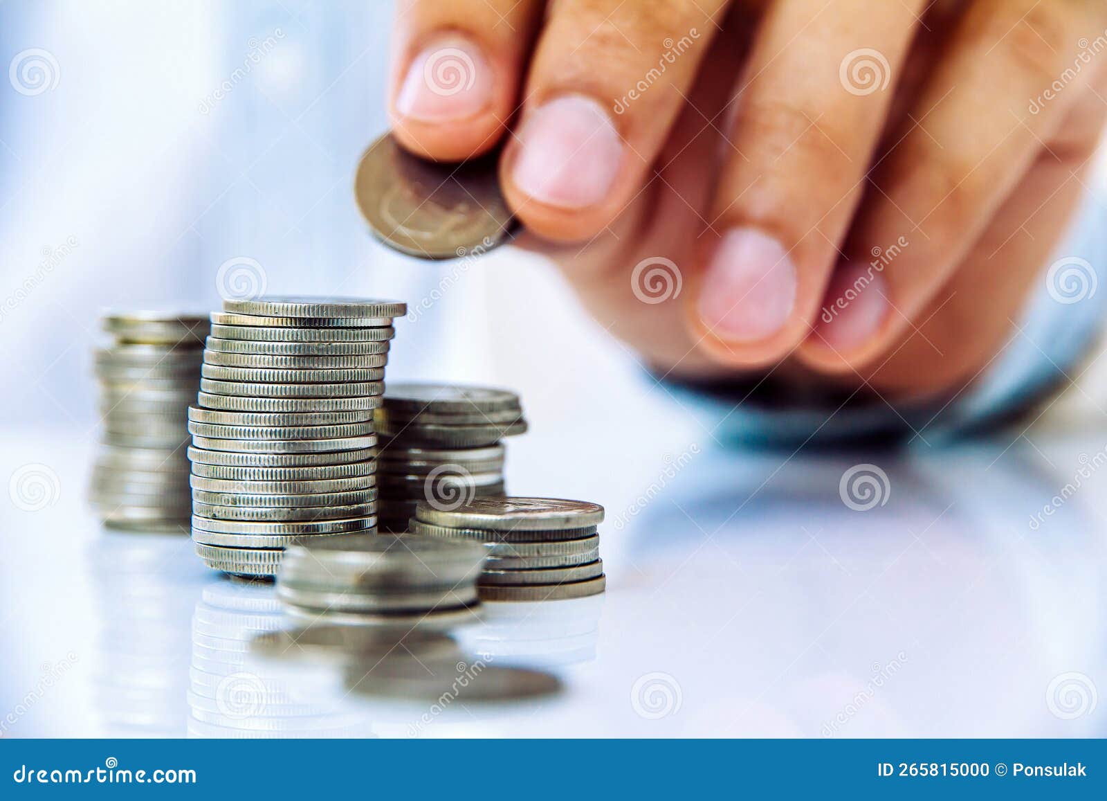 Hand put coin to stack stock photo. Image of moving - 265815000