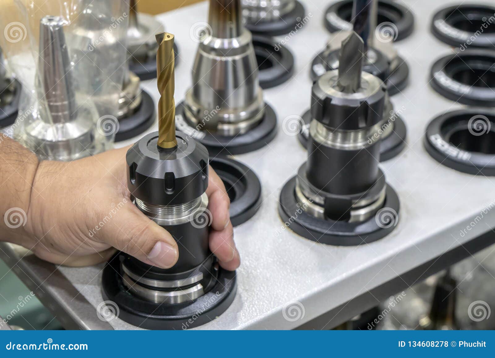 The Hand Put the Cutting Tool in Holder. Stock Photo - Image of ...