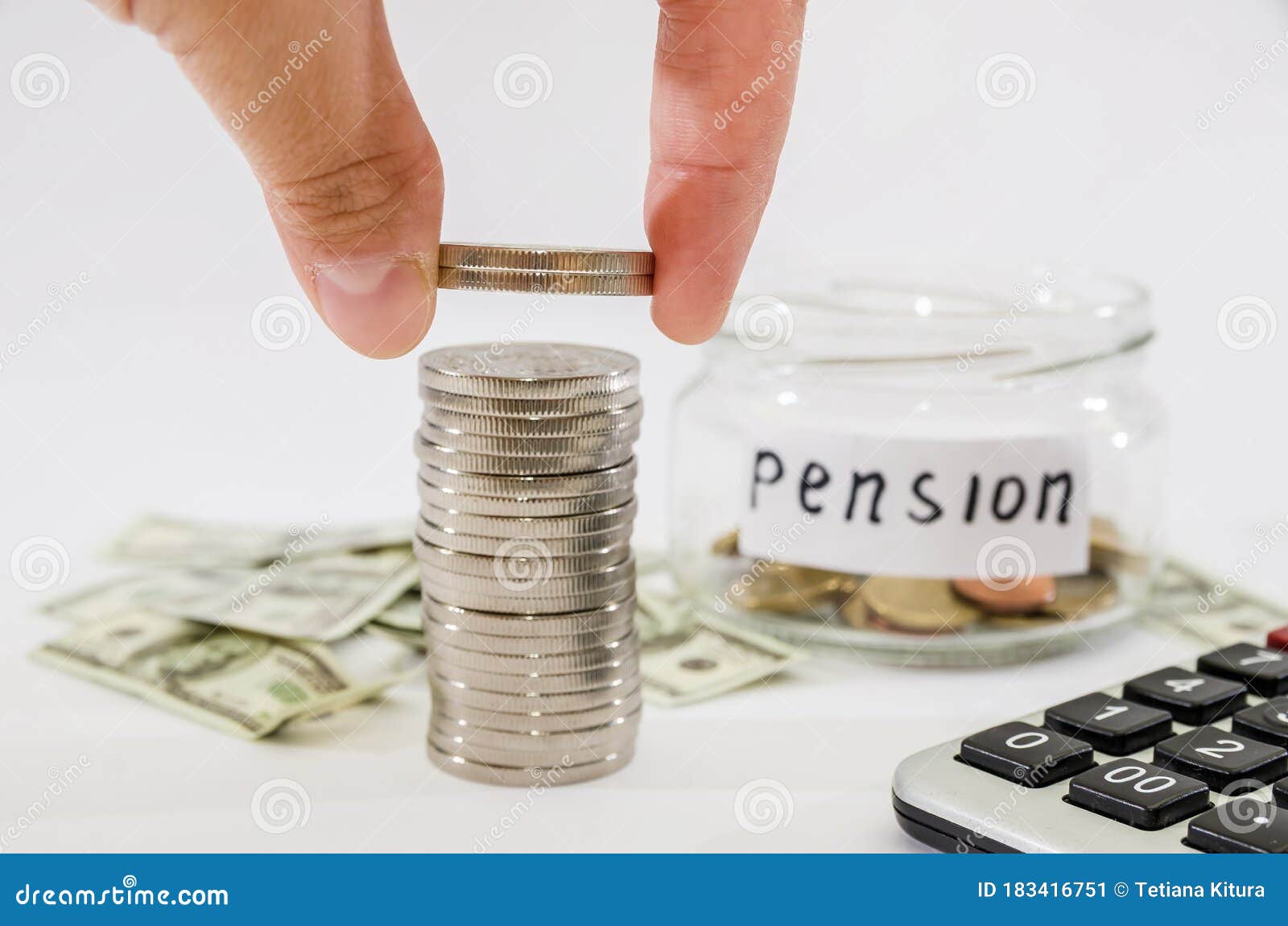 Hand Puts a Coin on a Stack of Coins. Pension Concept. White Background ...