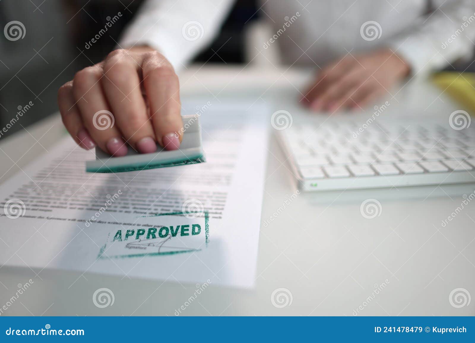 The Hand Puts the Stamp Approved on the Document Stock Image - Image of ...