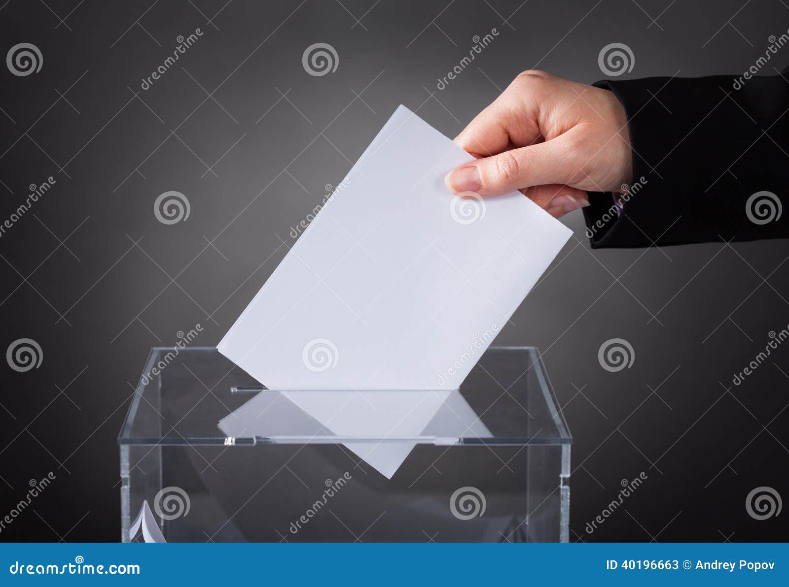 Hand putting ballot in box stock image. Image of inserting - 40196663