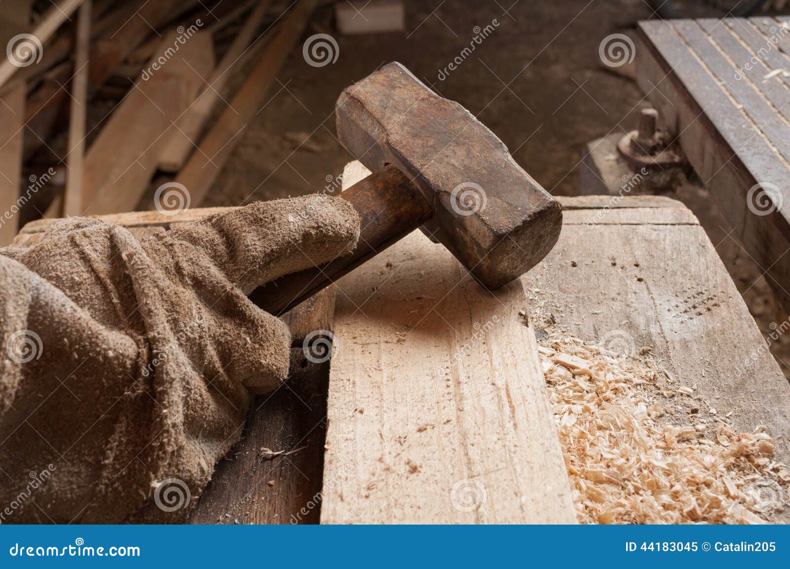 Hand Putting a Hamer on a Wooden Table Stock Image - Image of working ...