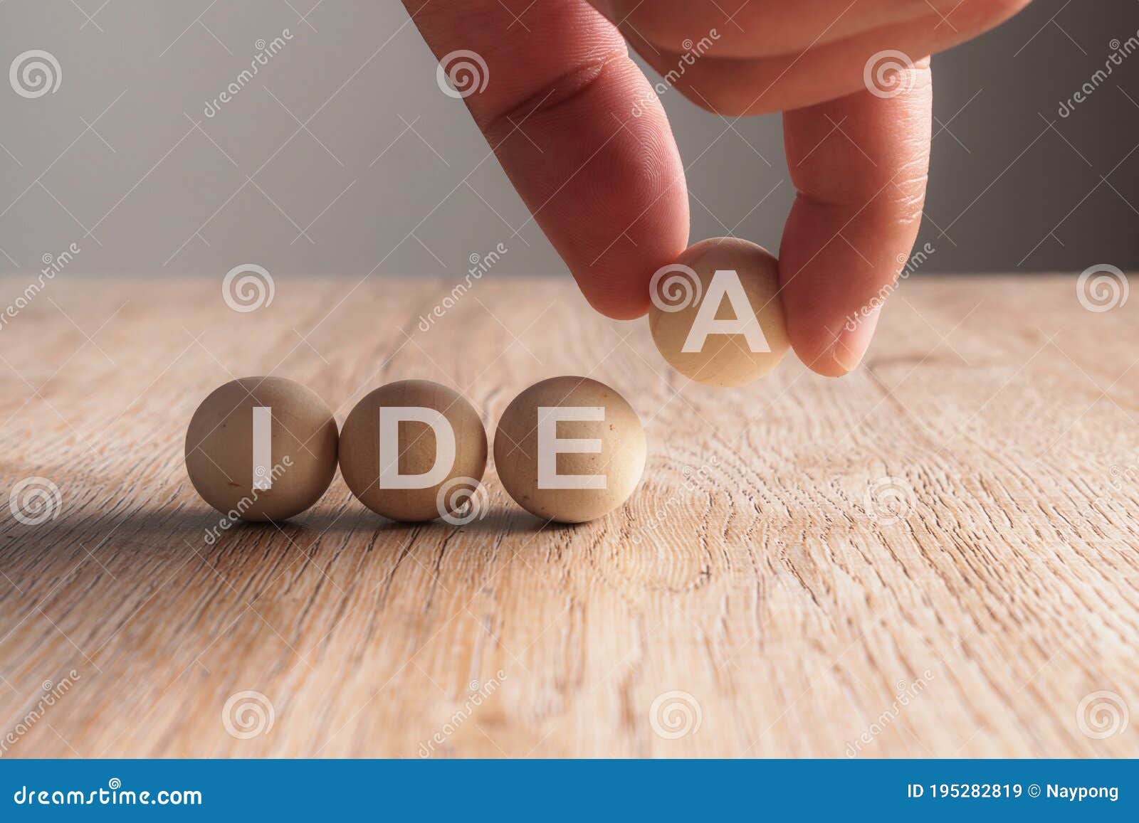 Hand Putting on Idea Word Written in Ball Stock Image - Image of ...
