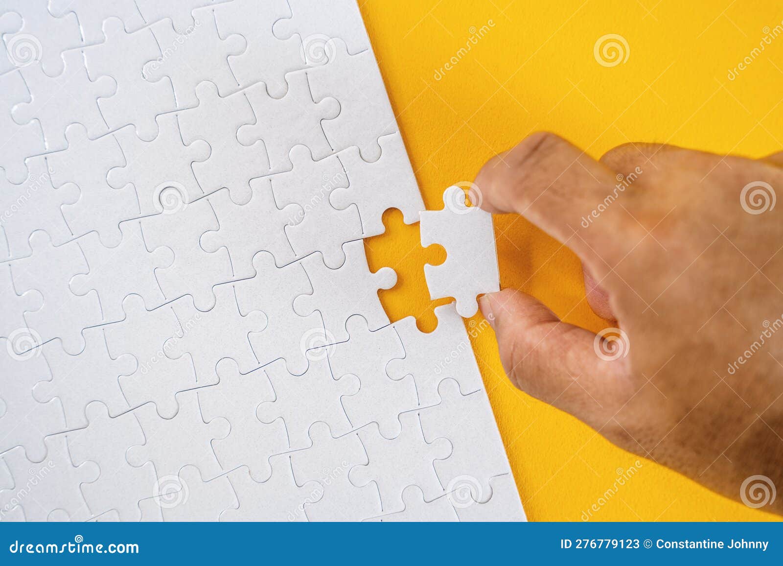 Hand Putting the Last Piece To Solve Jigsaw Puzzle Stock Image - Image ...