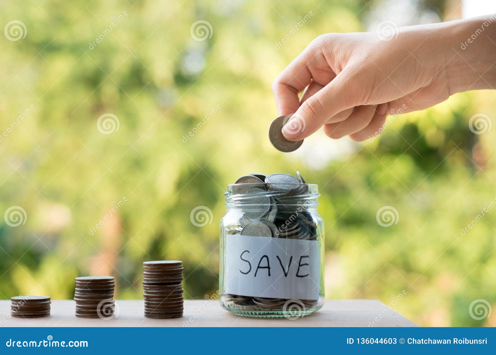 Hand Putting Money Coins Stack Growing, Saving Money for Purpose ...