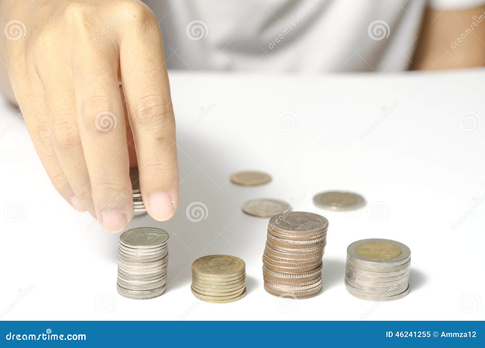 Hand Putting Stack of Coins Stock Image - Image of gold, bank: 46241255