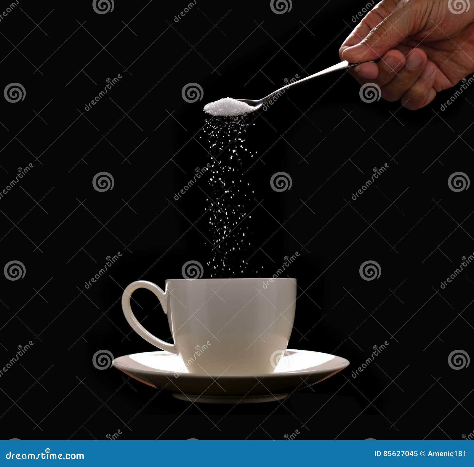 Hand Putting Sugar in Coffee Cup on Black Stock Image - Image of brown ...