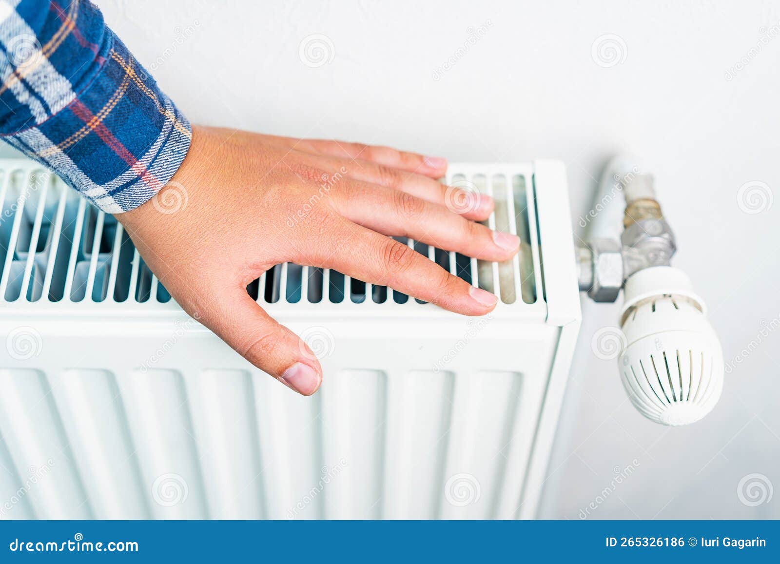 Hand on the Radiator of the Heating System, Selective Focus. Background ...
