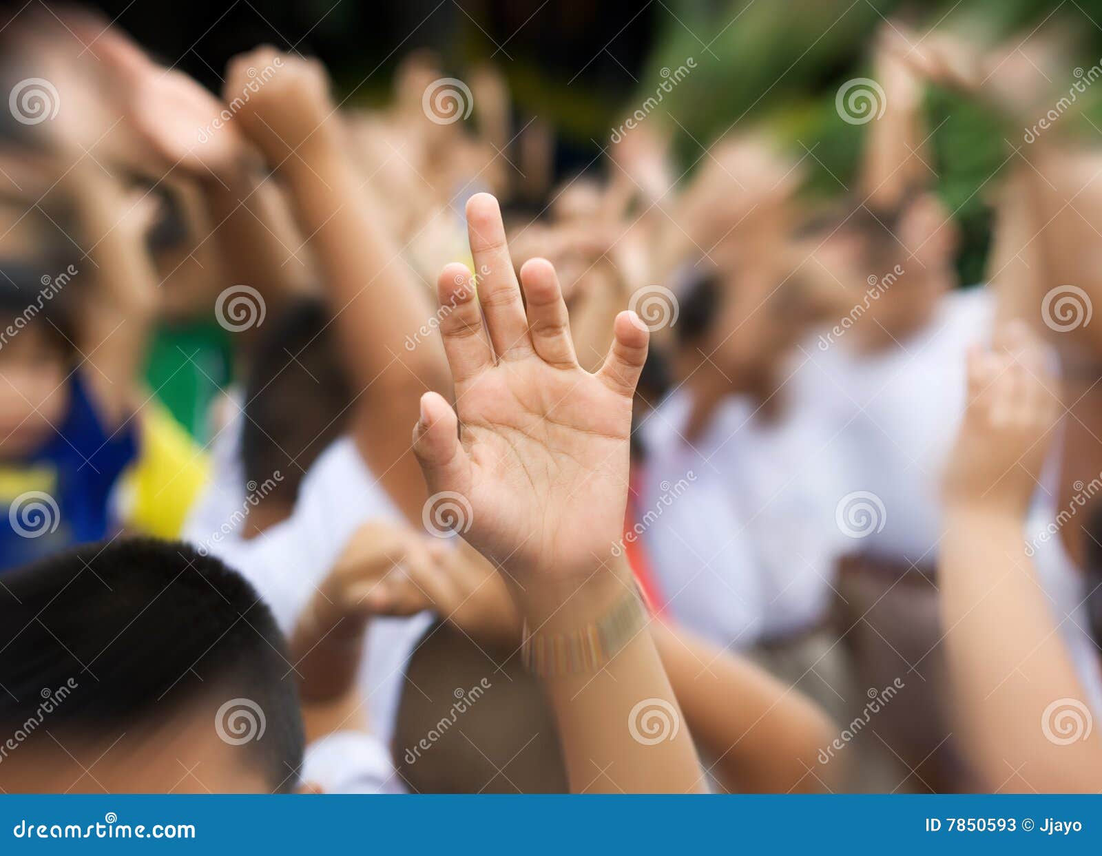 Hand raised in schoolyard stock image. Image of bracelet - 7850593
