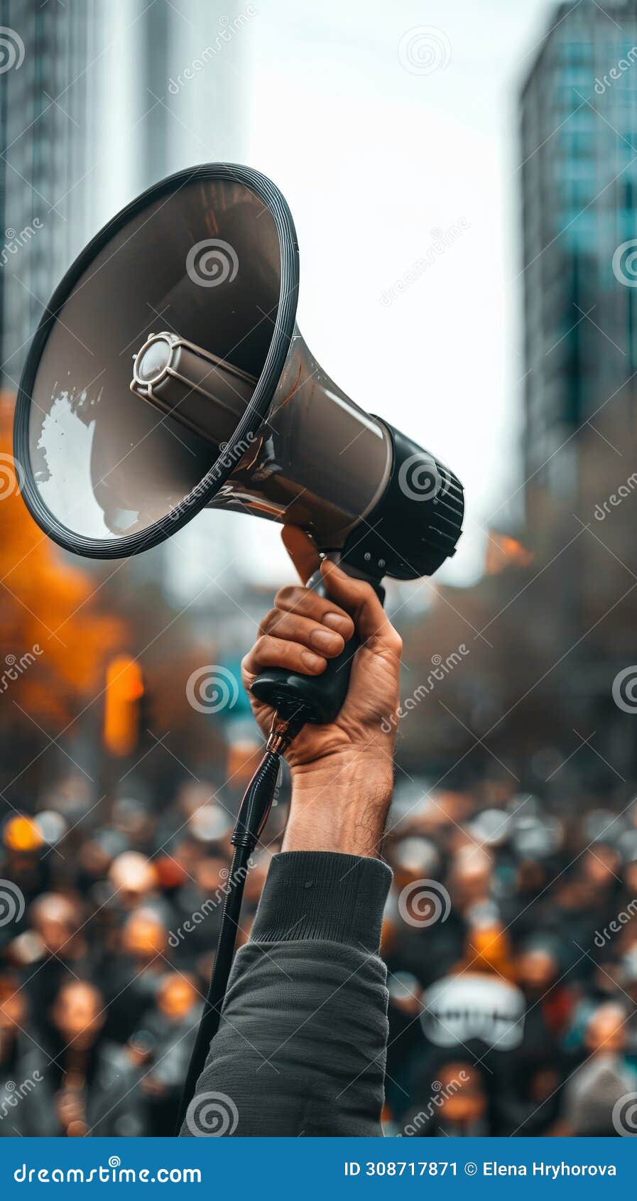 Hand Raising a Megaphone at a Public Demonstration, Voice of Protest ...