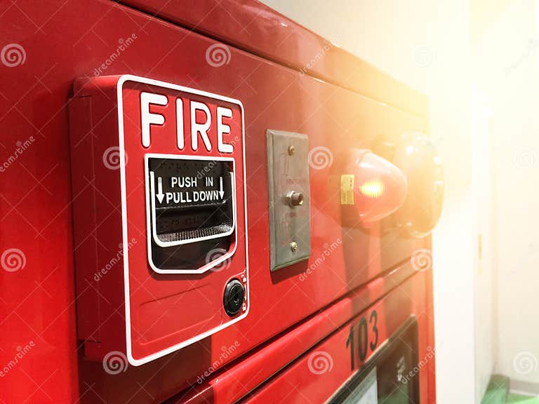 A Hand Reaching and Pulling a Red Fire Alarm Switch. Red Fire Alarm ...