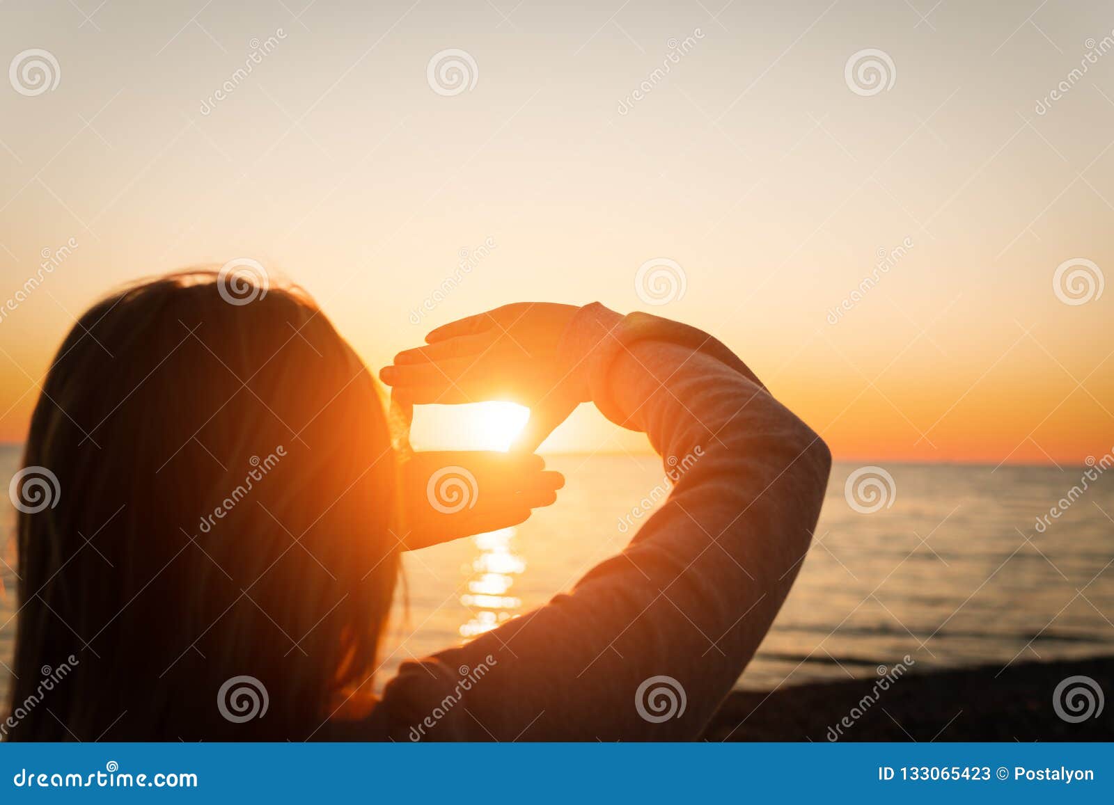 Hand Reaching for Sun. Sunset Sun Over the Sea Stock Image - Image of ...