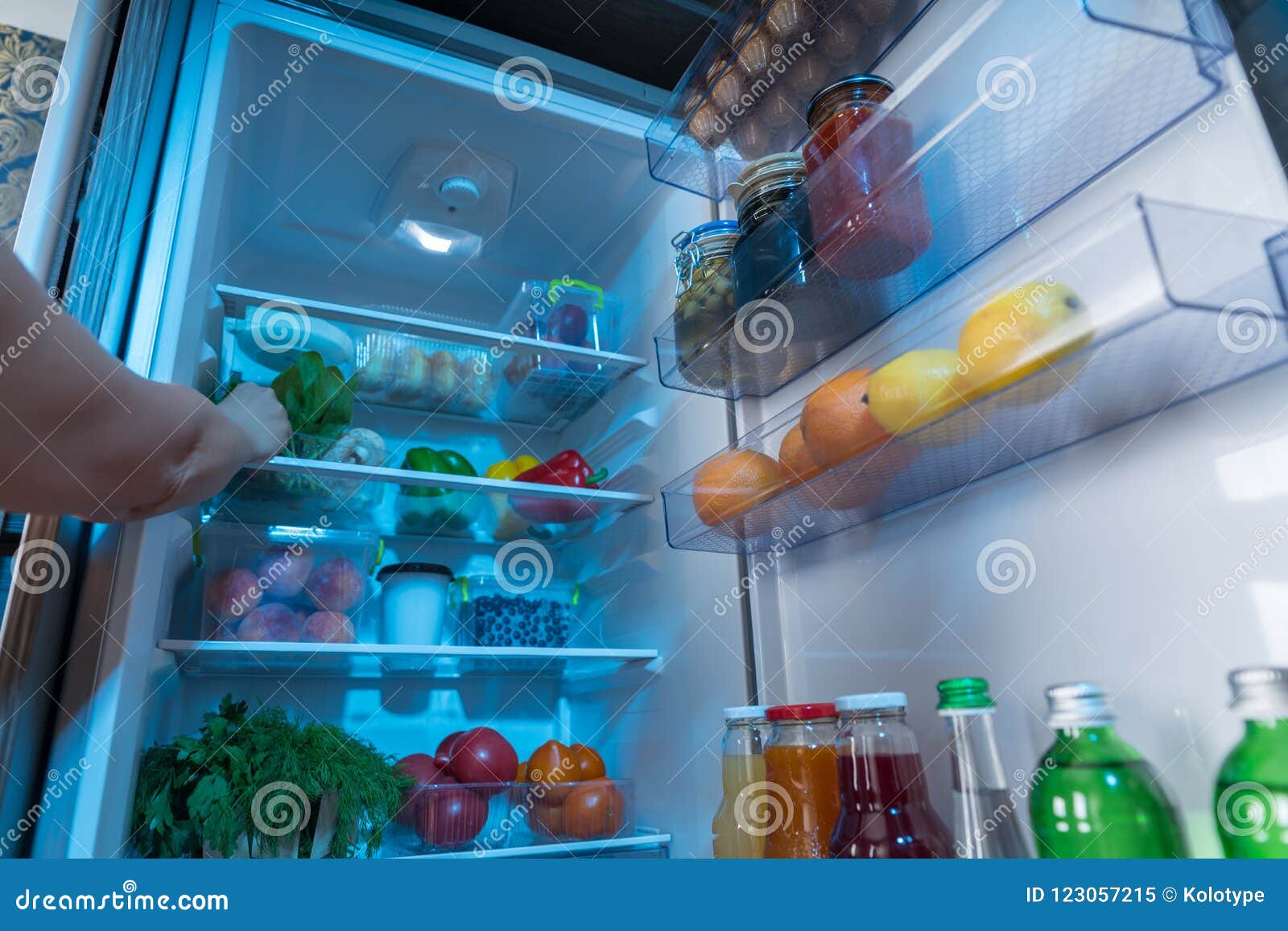 Hand Reaching for Vegetables in Open Fridge Stock Image - Image of ...