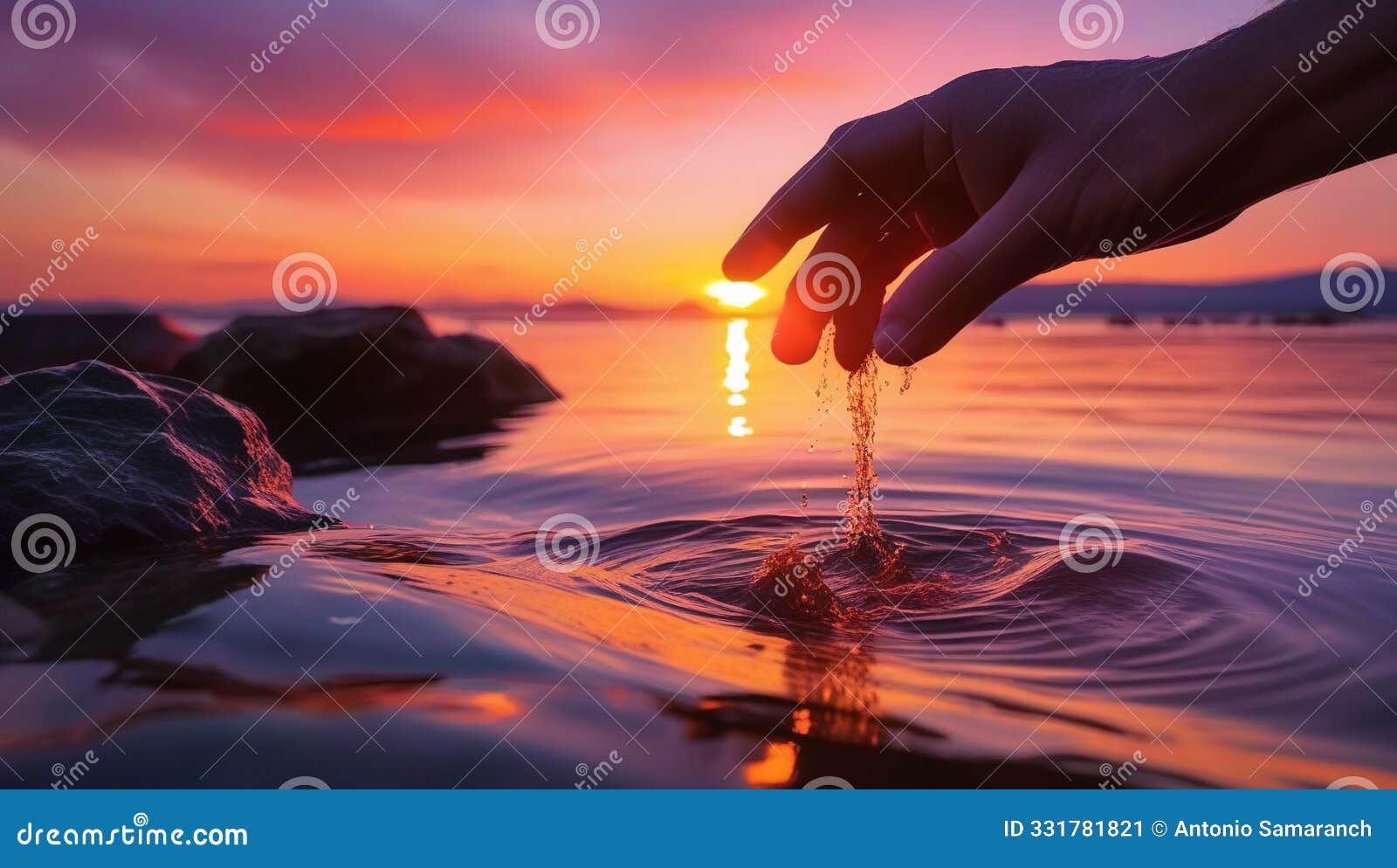 Hand Reaching for the Water with the Sun Setting Behind Them Stock ...