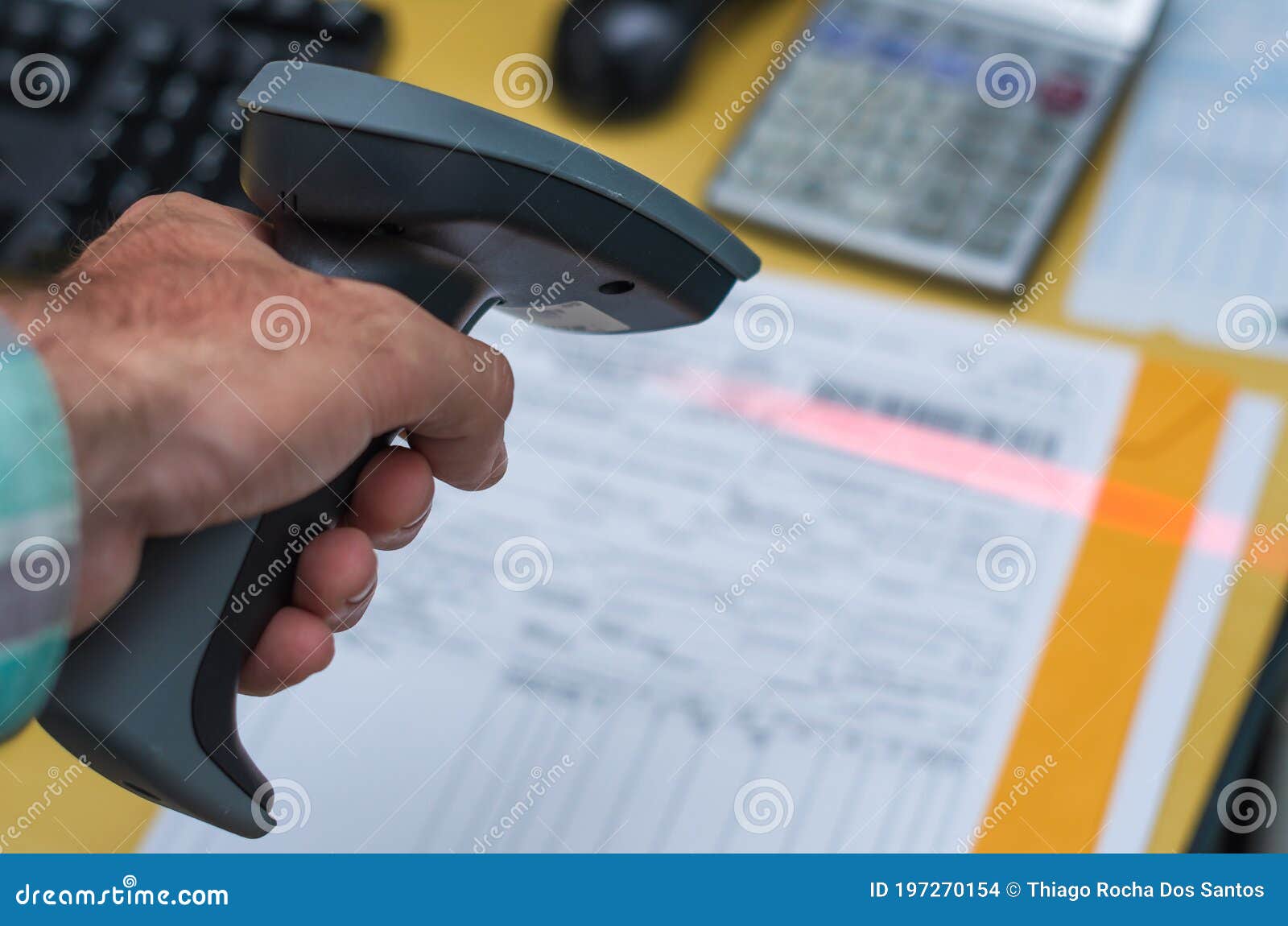 Hand Reading the Invoice Barcode, Stored Data in the System, Making ...