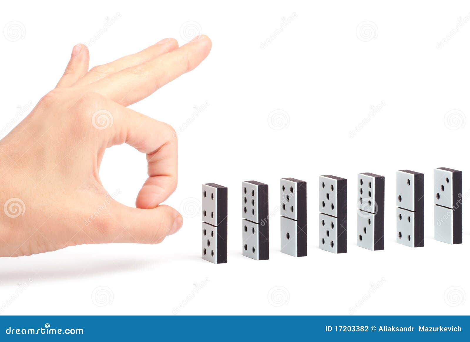 Hand Ready To Push Dominoes Stock Photo - Image of effect, leisure ...