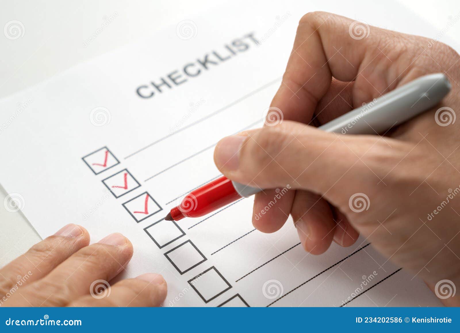 Hand with Red Marker Pen Marking on Checklist Box Stock Photo - Image ...