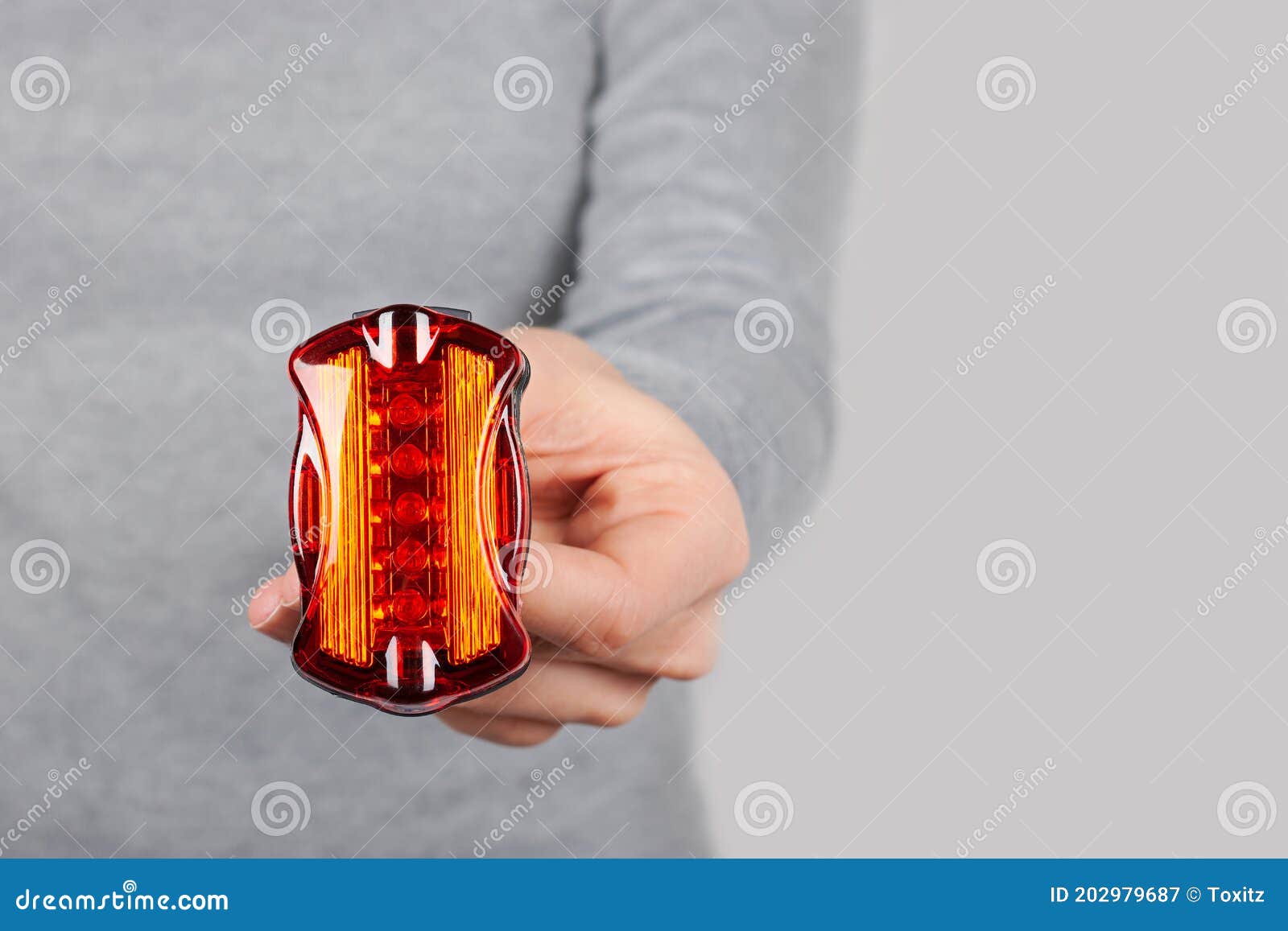 Hand with Red Stop Light on Grey Background Stock Image - Image of ...