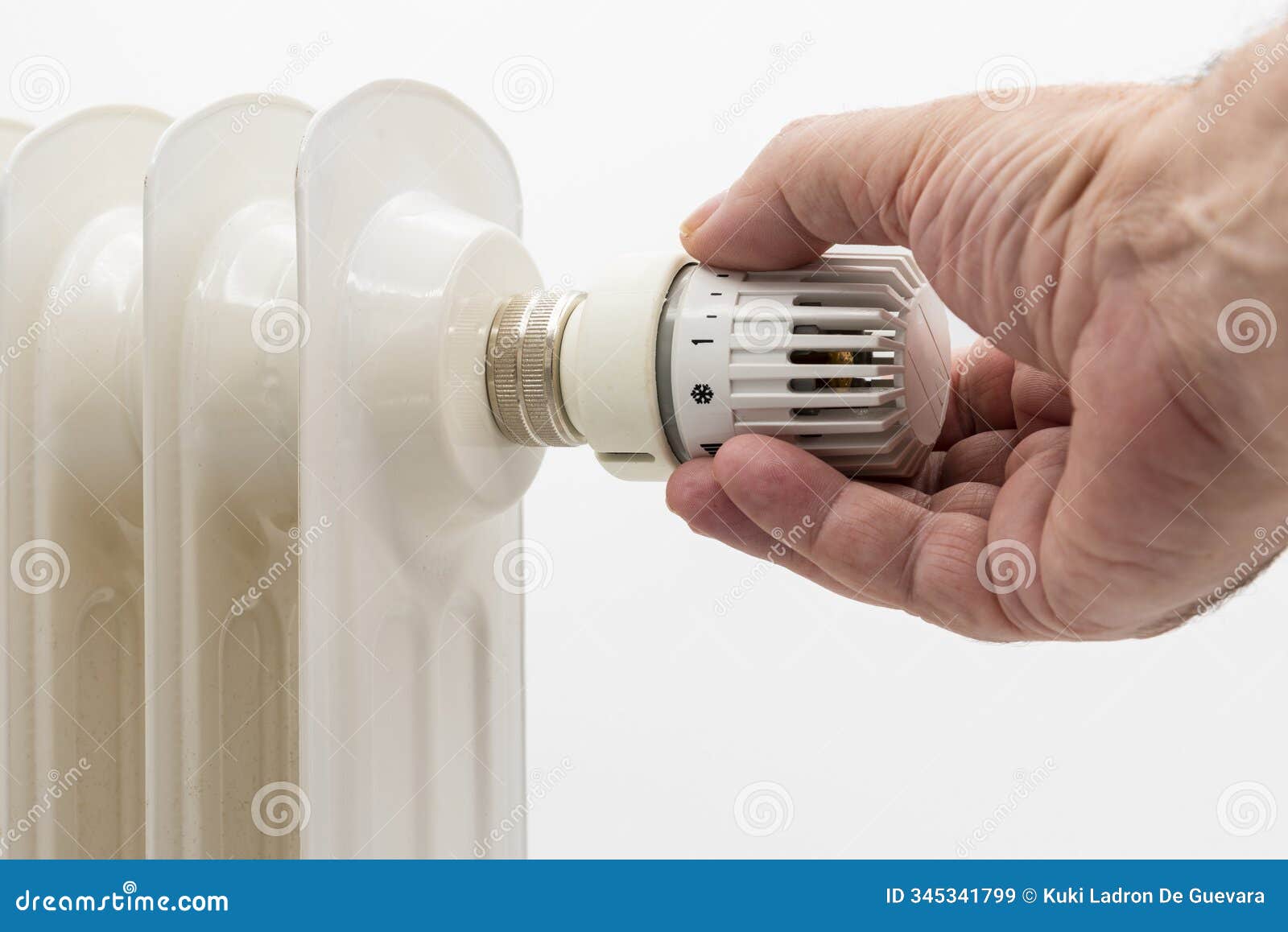 Hand Regulating a Heating Radiator, Isolated on White Stock Image ...