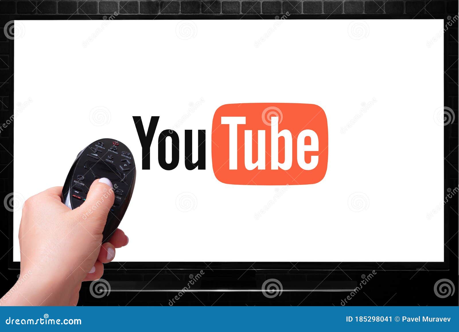 Hand with a Remote Control on the Background of the TV with YOUTUBE ...