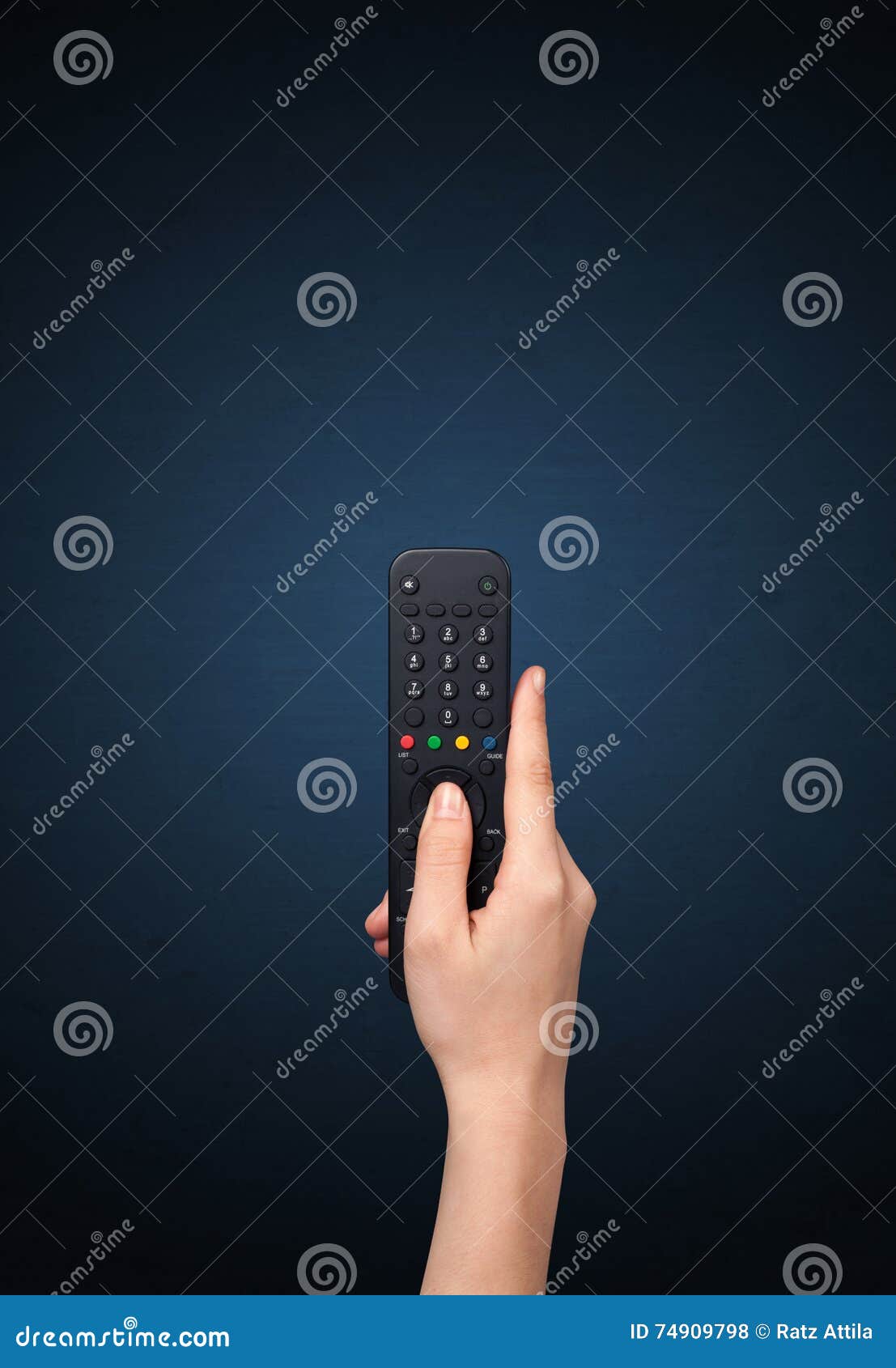 Hand with remote control stock photo. Image of full, background - 74909798