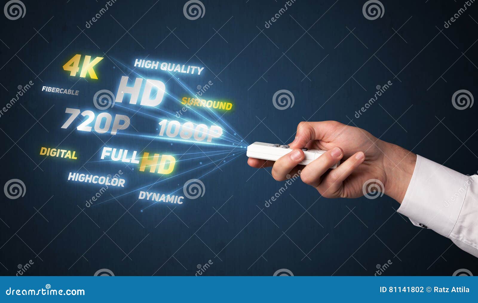 Hand with Remote Control and Multimedia Properties Stock Photo - Image ...