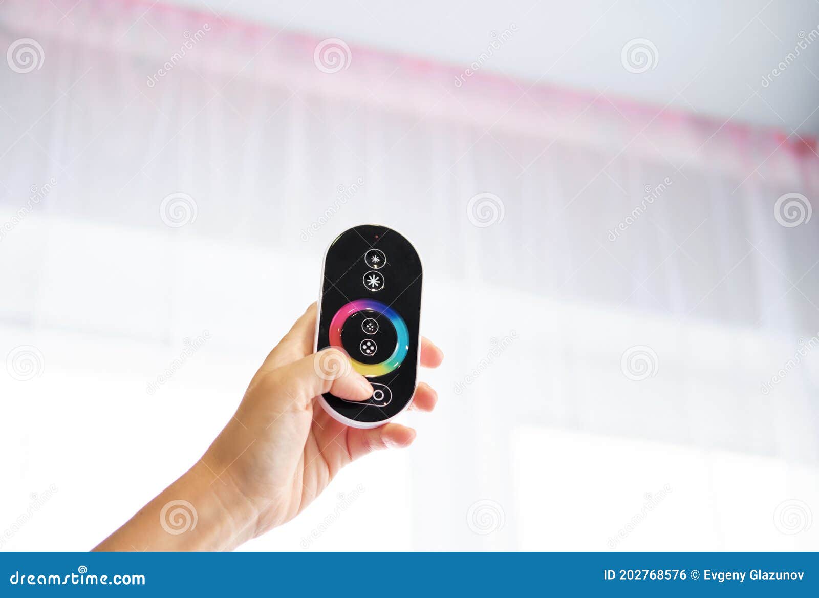 Hand with Remote Control on Off. LED Light Remote Control Stock Photo ...