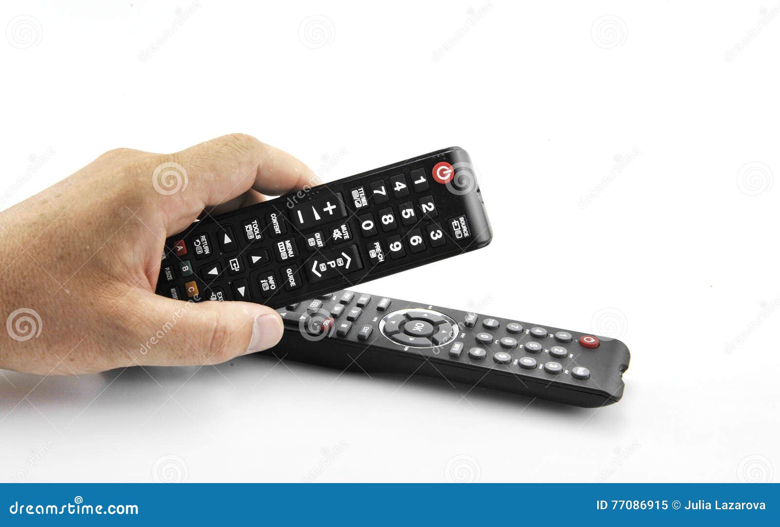 Hand with Remote Control Pointing Forward Isolated at White September ...