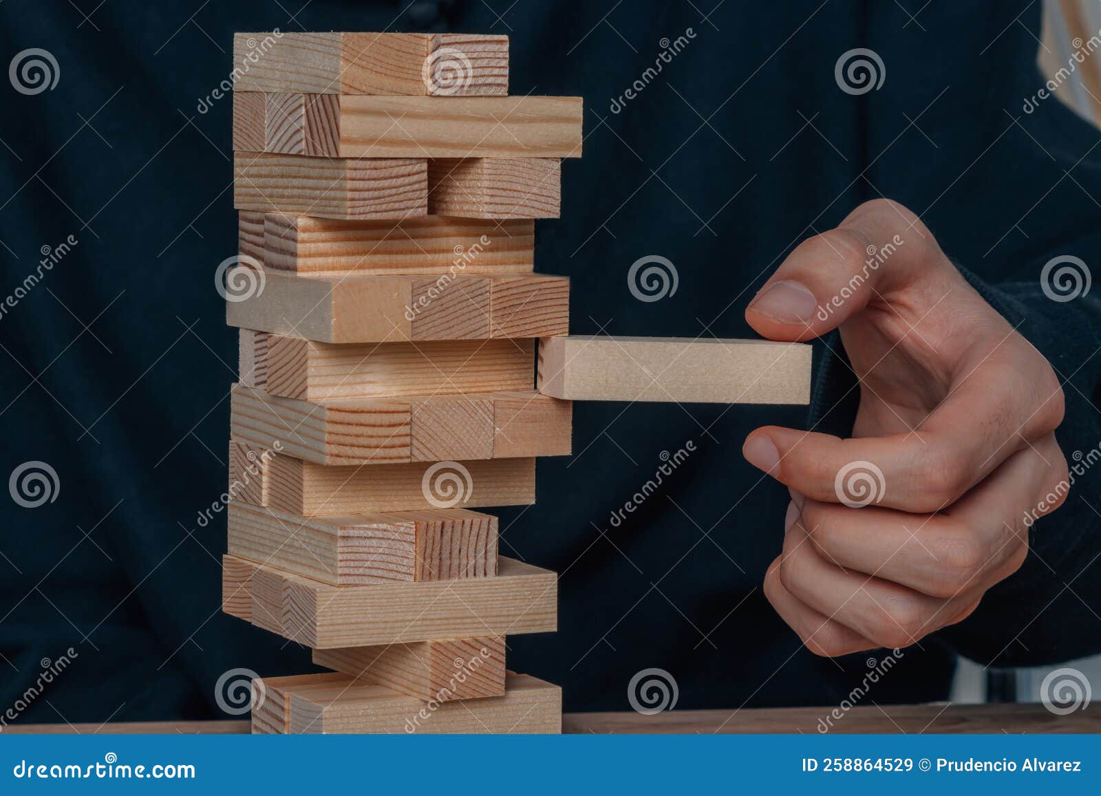 Hand removing piece puzzle stock image. Image of intelligence - 258864529