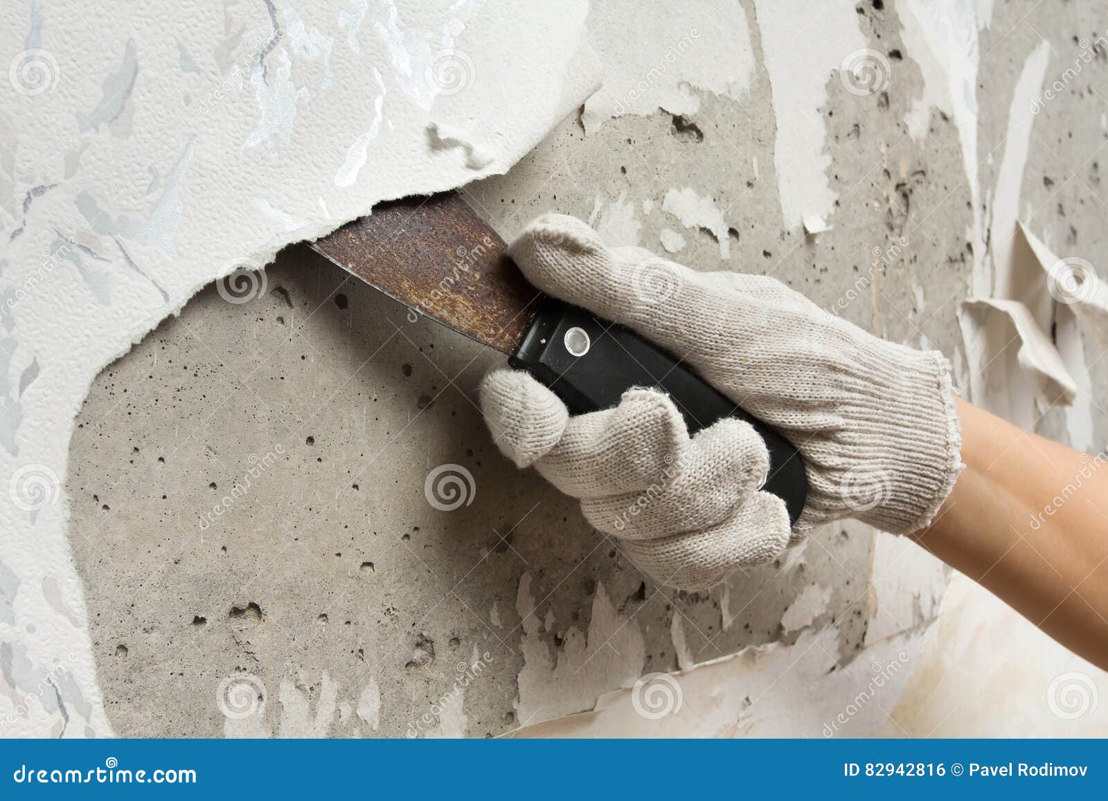 Hand Removing Wallpaper from Wall with Spatula Stock Photo - Image of ...