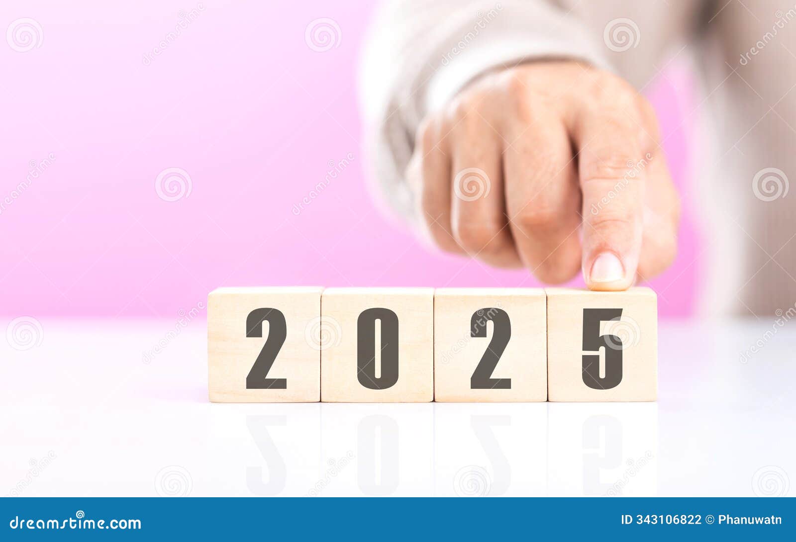 Hand Replaces 2024 With 2025 Using Number Blocks, Symbolizing The ...