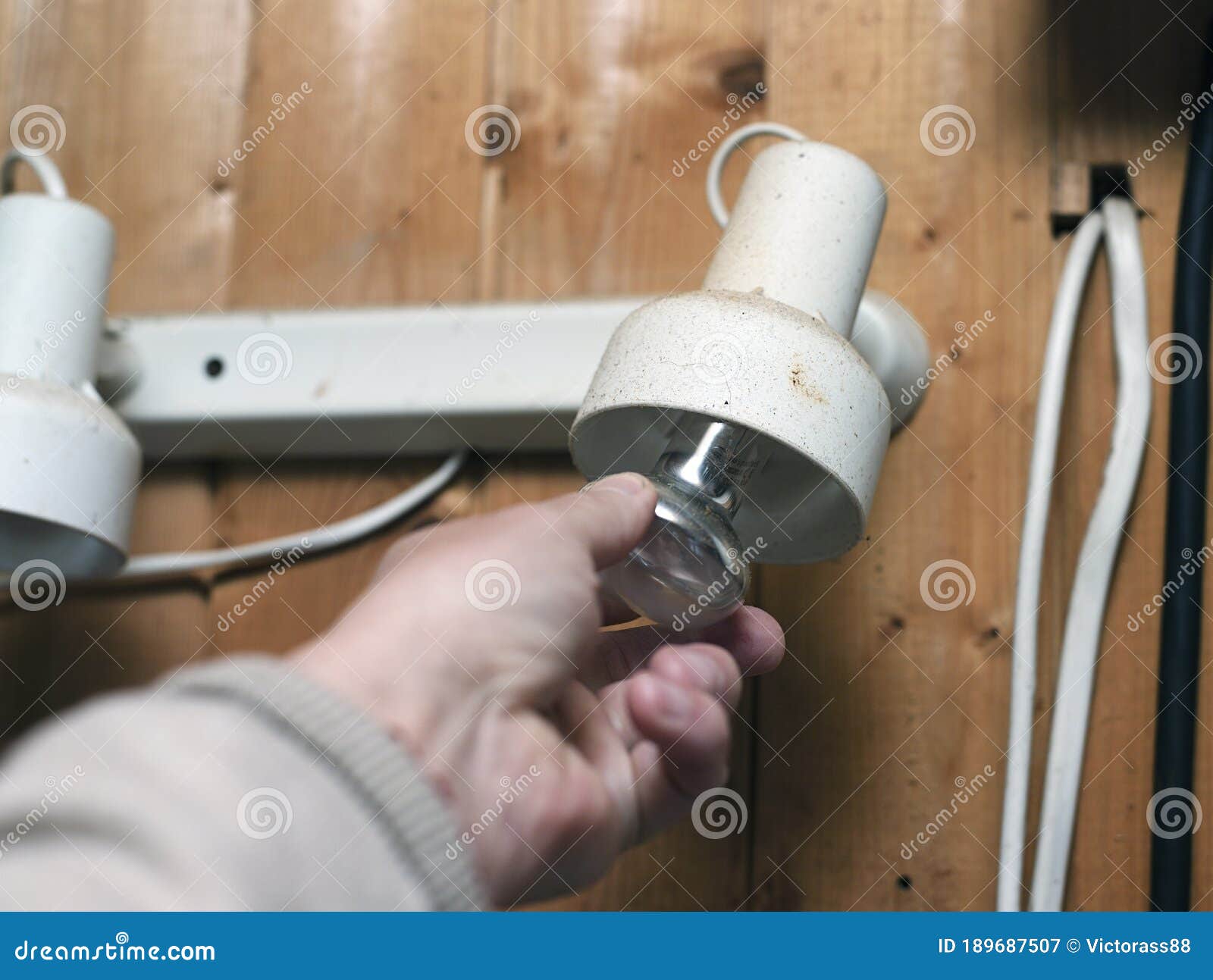 Hand replacing a bulb stock image. Image of light, maintenance - 189687507