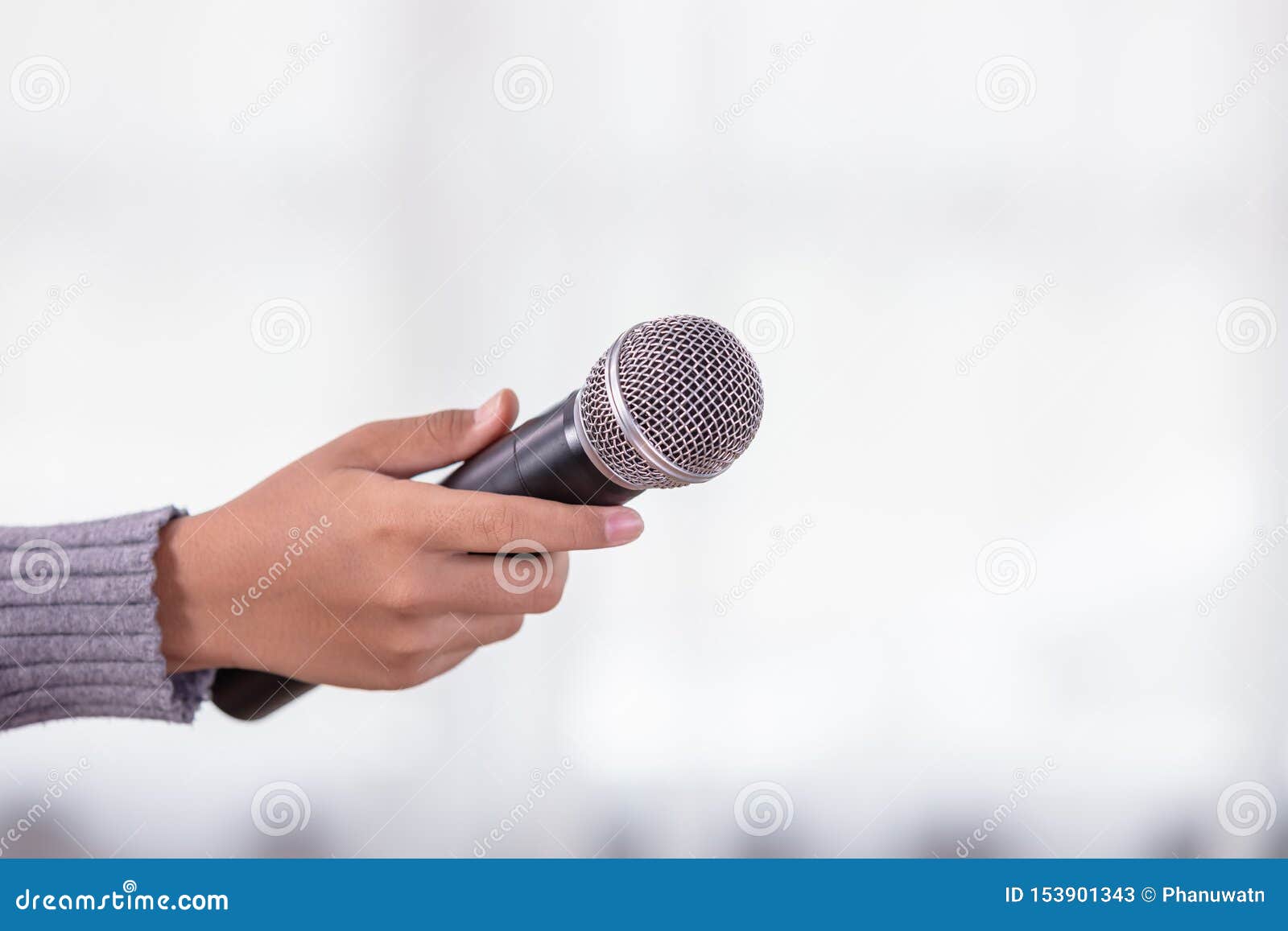 Hand of Reporter Holding New Black Microphone Stock Image - Image of ...