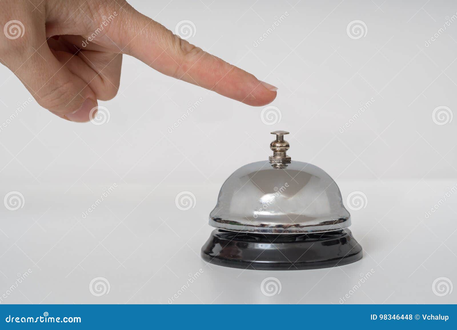 Hand is Ringing Silver Service Bell on White Background Stock Photo ...