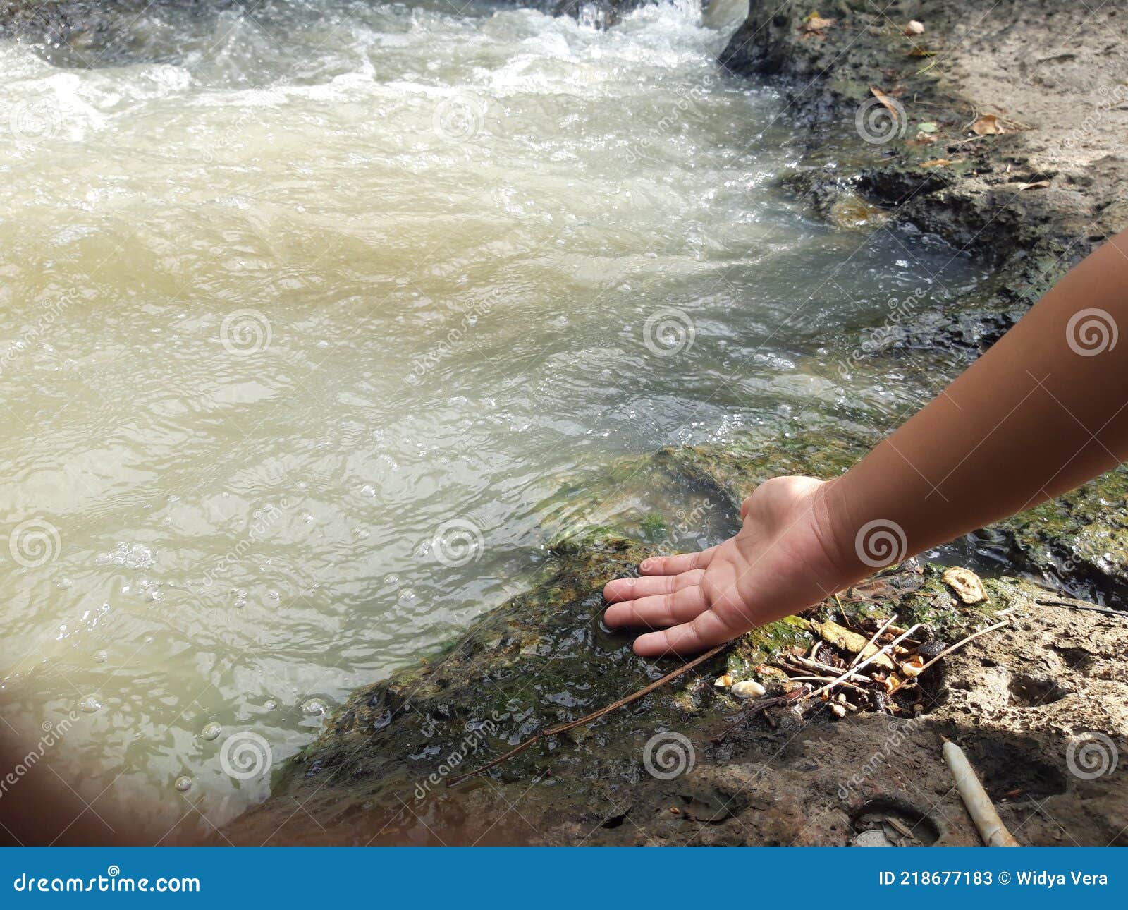 A hand in a river stock image. Image of water, adventure - 218677183